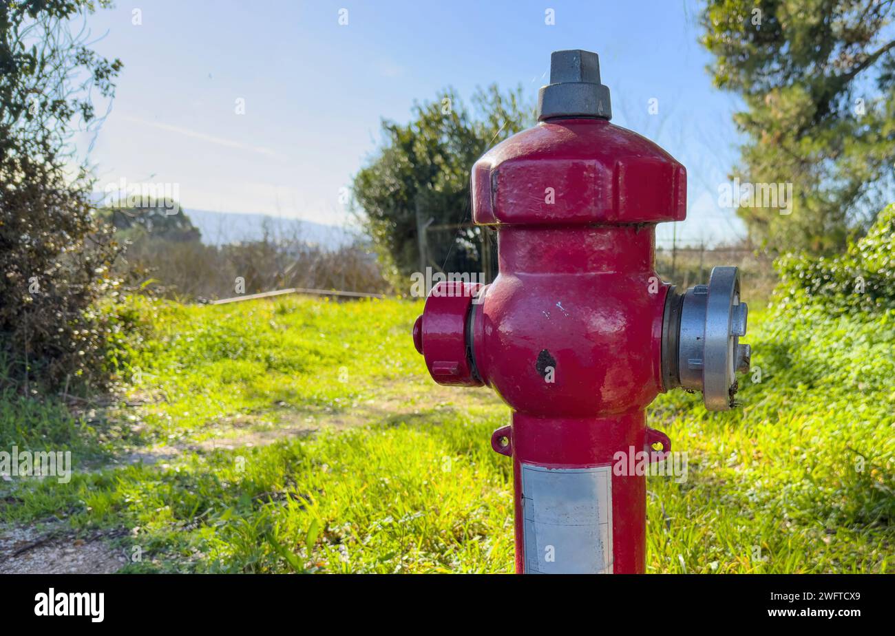 Fire fighting public system. Fire hydrant hose connection red color ...