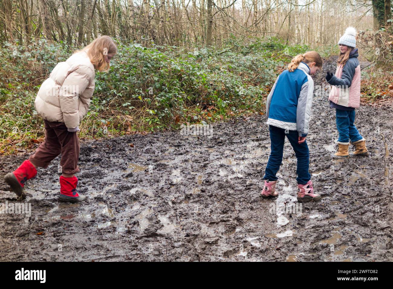 Three young girls / girl / sisters aged 13, 11 & age 9, walking ...