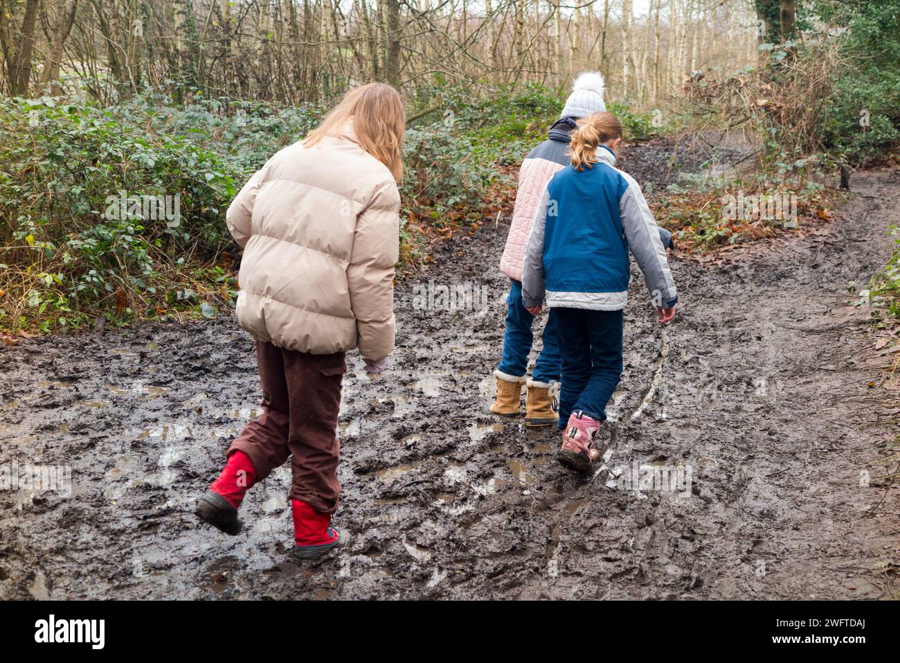 Three young girls / girl / sisters aged 13, 11 & age 9, walking ...