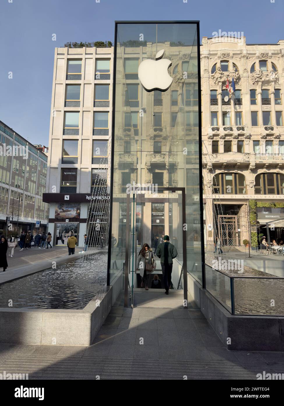 The beautiful Apple store, in Piazza Liberty, Milan, Italy Stock Photo ...