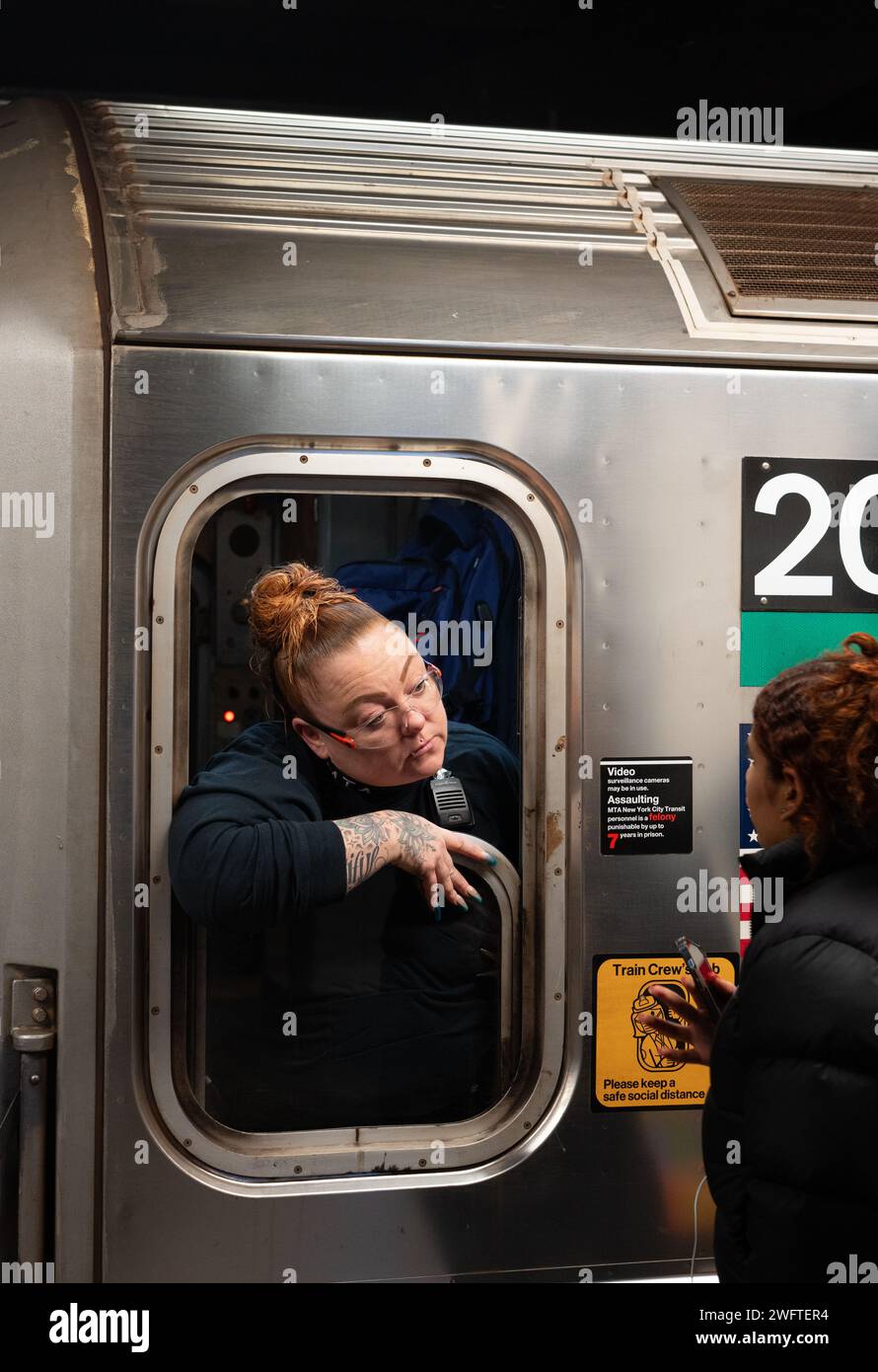 A train operator in a New York City subway station. Photo date: Friday ...