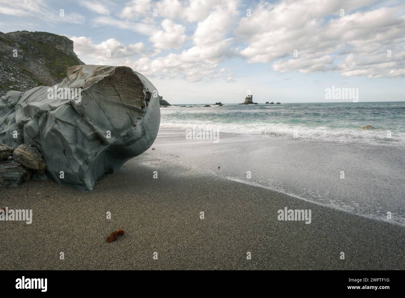 Surprising erosion in a very hard block of pure quartz on a beach in ...