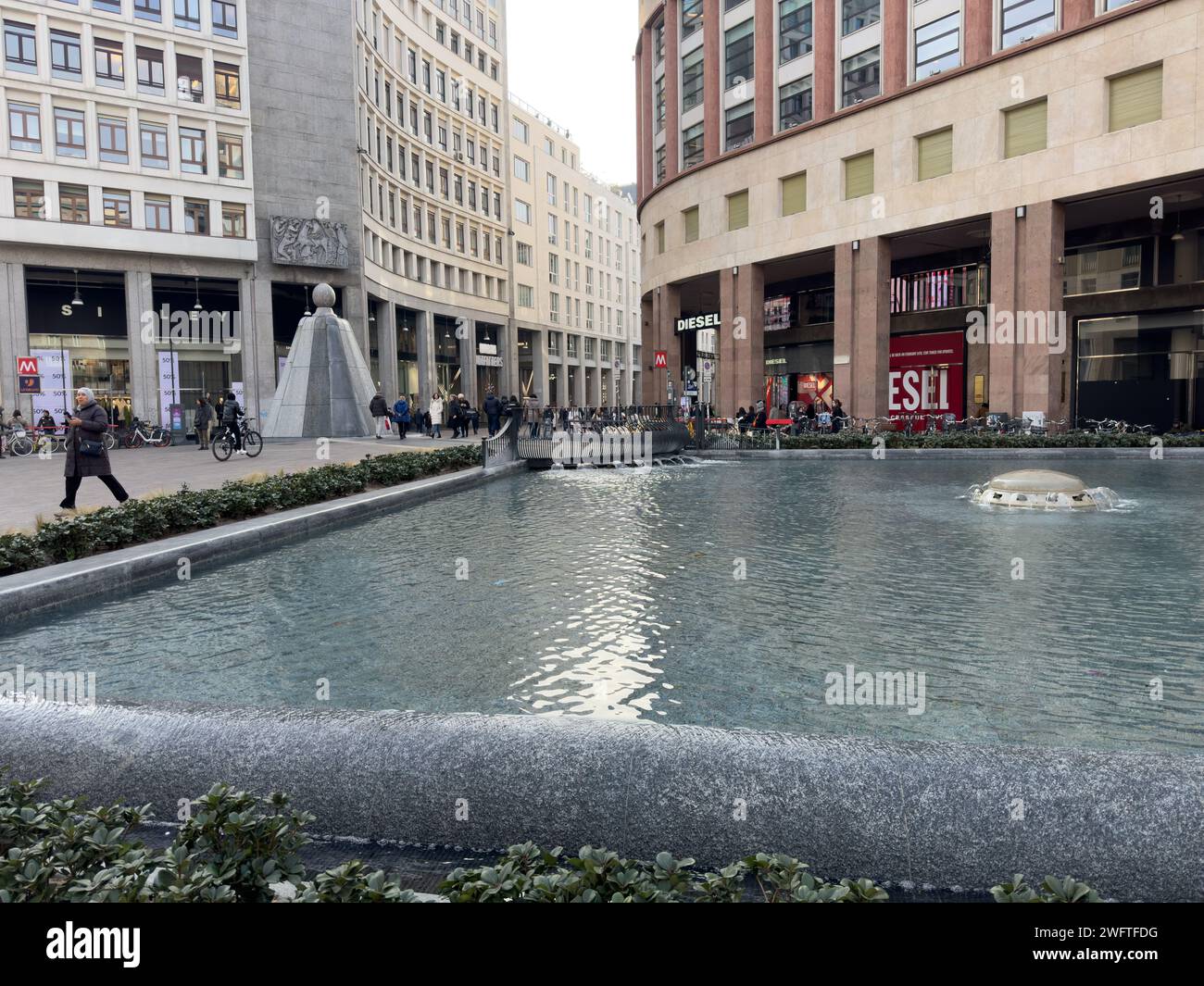 the famous piazza San Babila, Milan, Italy Stock Photo - Alamy