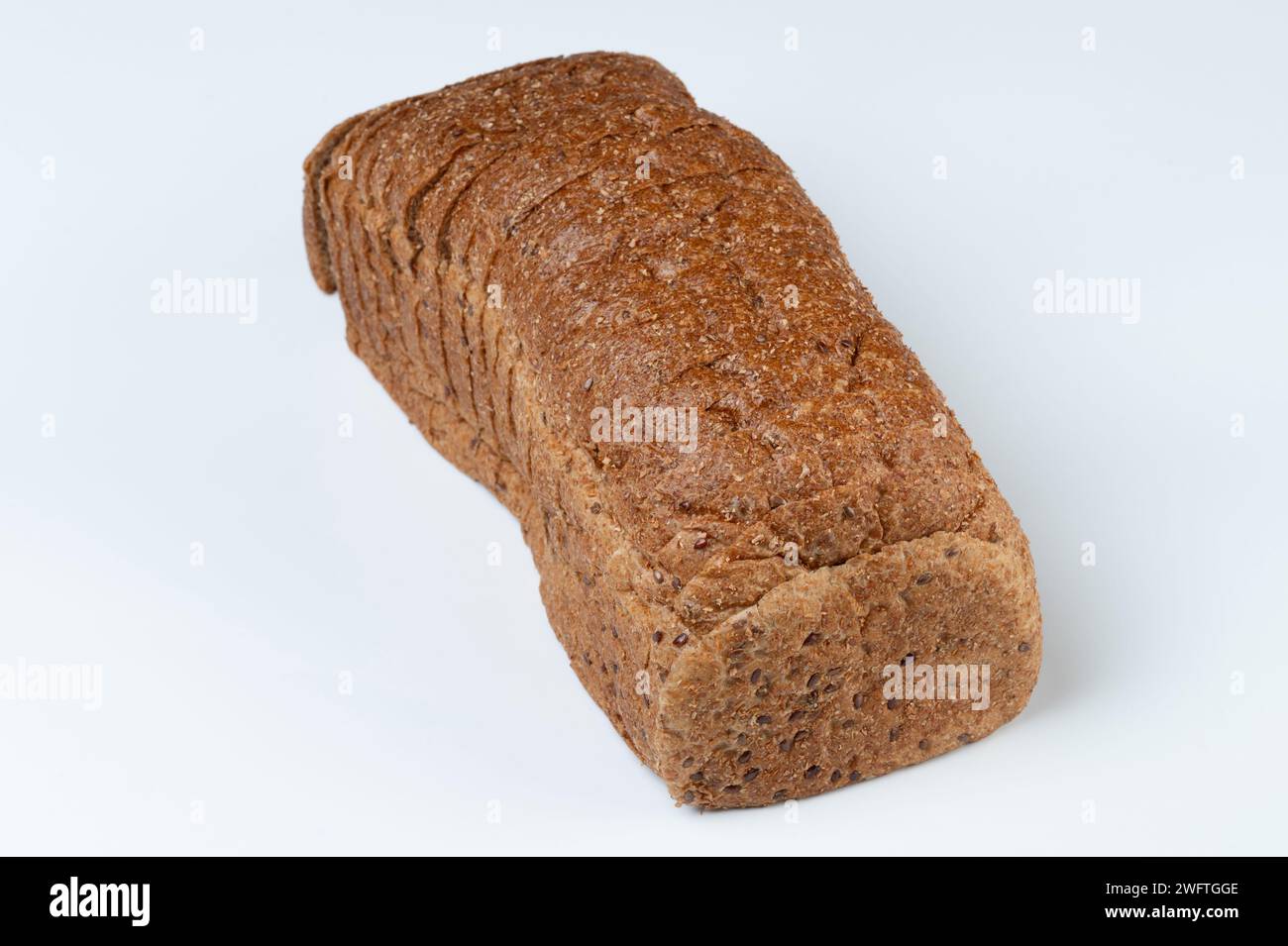 One sliced brown bread isolated on white studio background Stock Photo ...