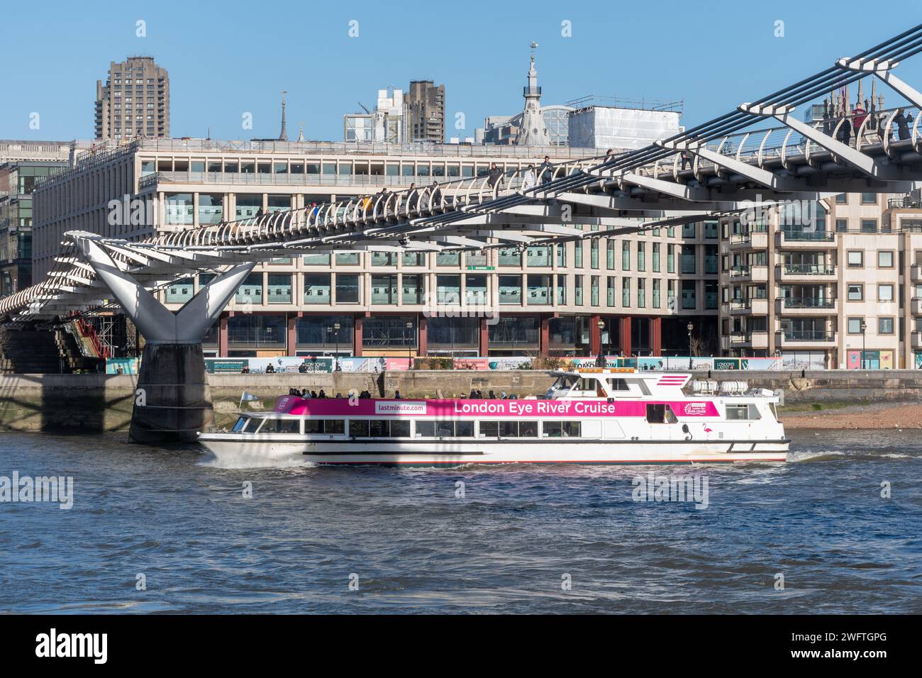 View of the Millennium Bridge across the River Thames in London ...