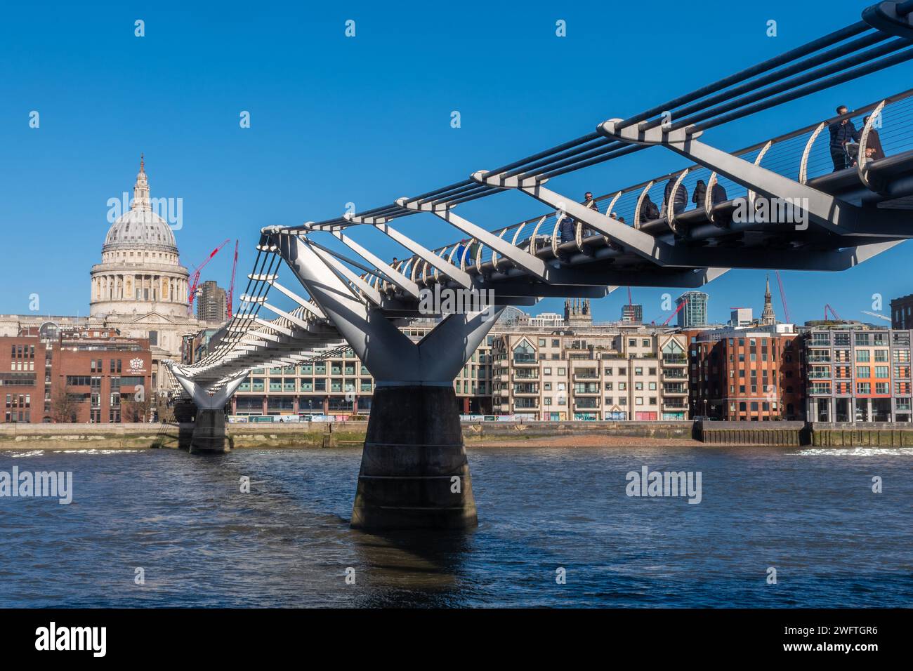 View of the Millennium Bridge across the River Thames with St Paul's ...