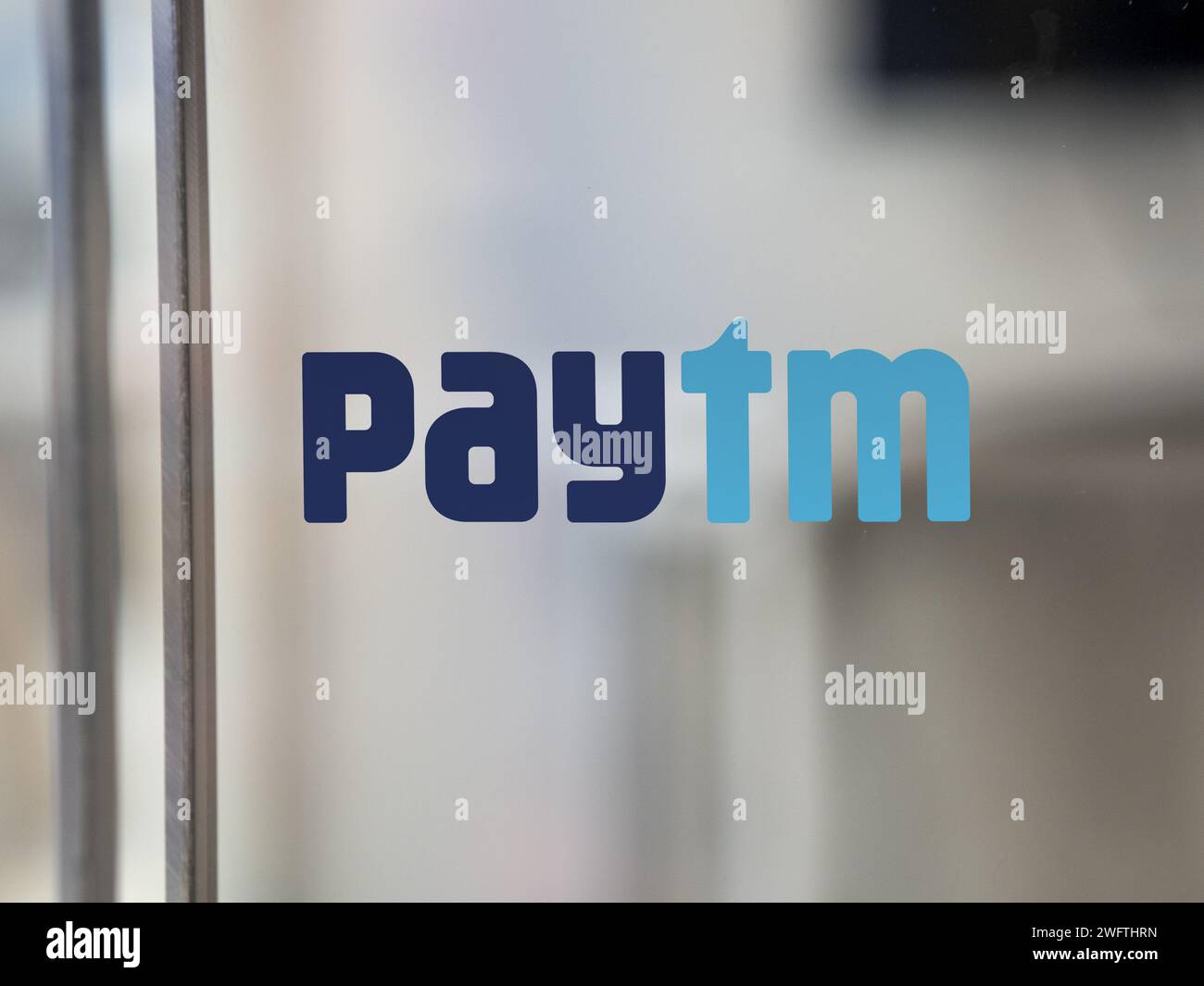 February 1st 2024, France. Logo of Paytm on a window's little shop ...
