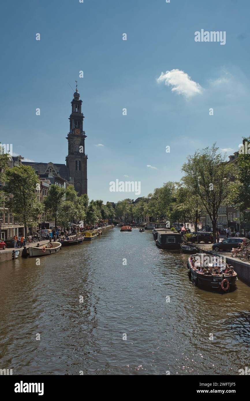 Amsterdam,Netherlands- July 8,2022: Amsterdam canal with cruise boats ...