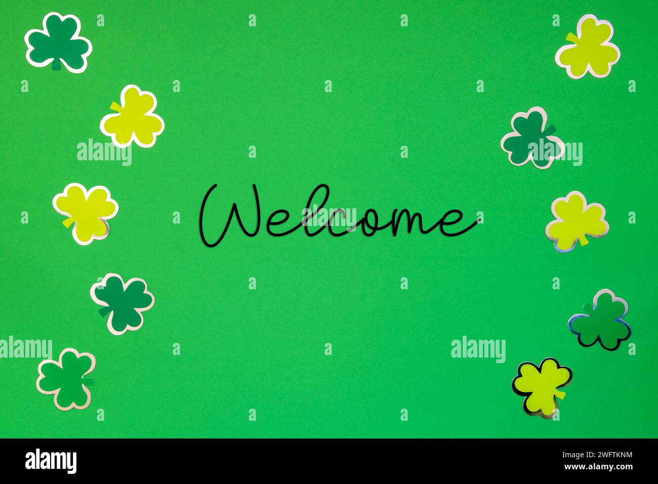 Flat Lay With English Text Welcome. Green Paper Background With Saint ...