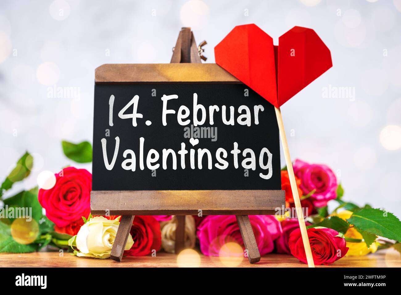 1 February 2024: Plaque surrounded by colorful roses and a heart with ...