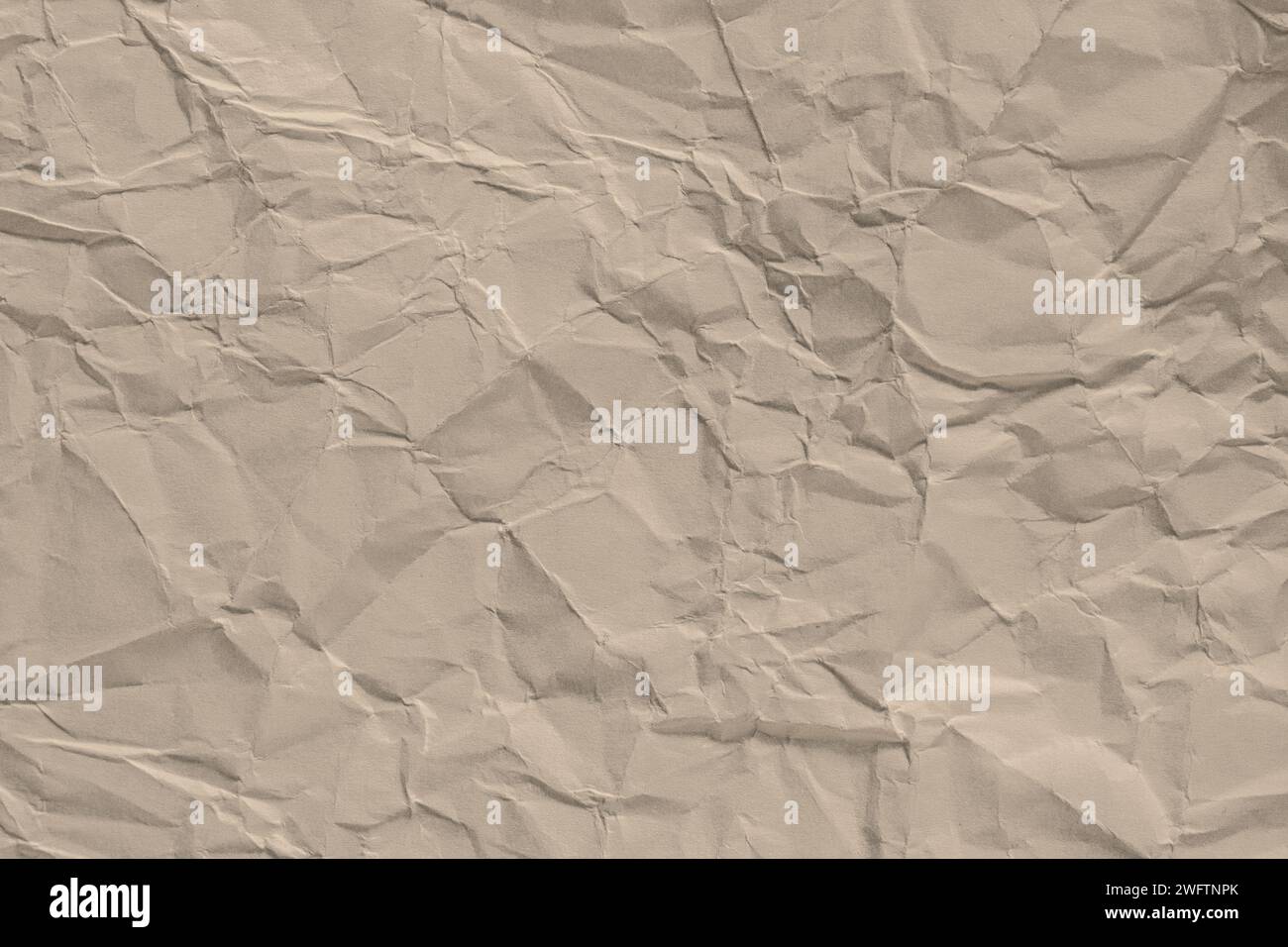 A neutral beige crumpled paper texture that serves as a versatile ...