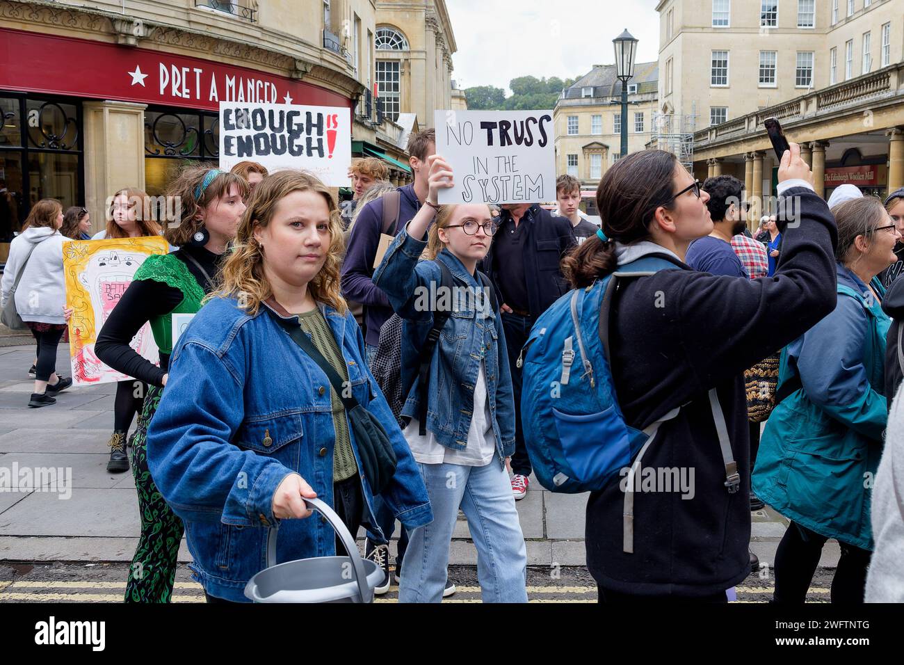 Bath, UK. 1st Oct, 2022. Protesters carrying placards are pictured in ...