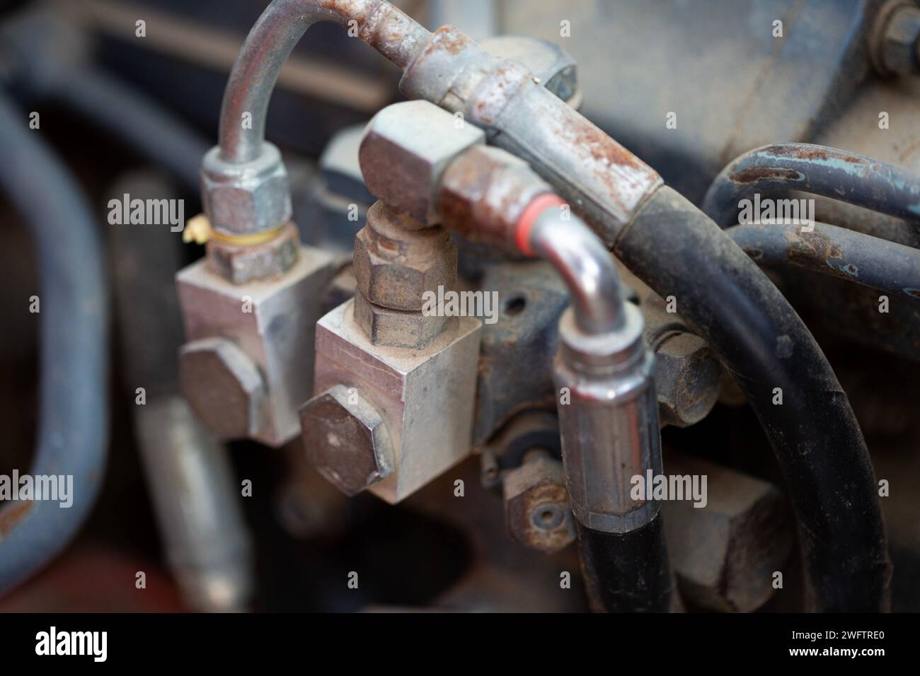 Closeup of parts of a farm tractor Stock Photo - Alamy