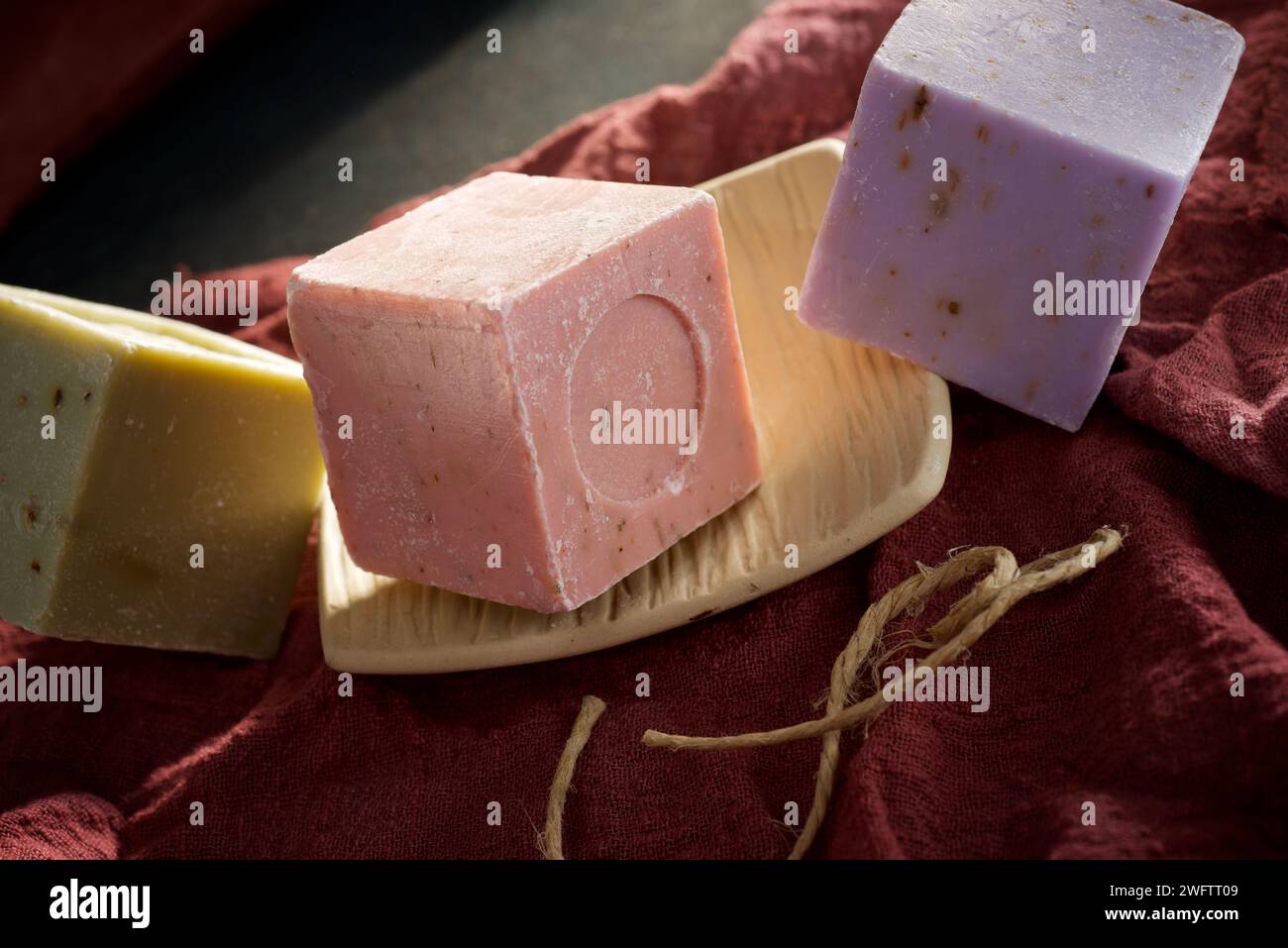 Cube-shaped bars of soap on a table Stock Photo - Alamy