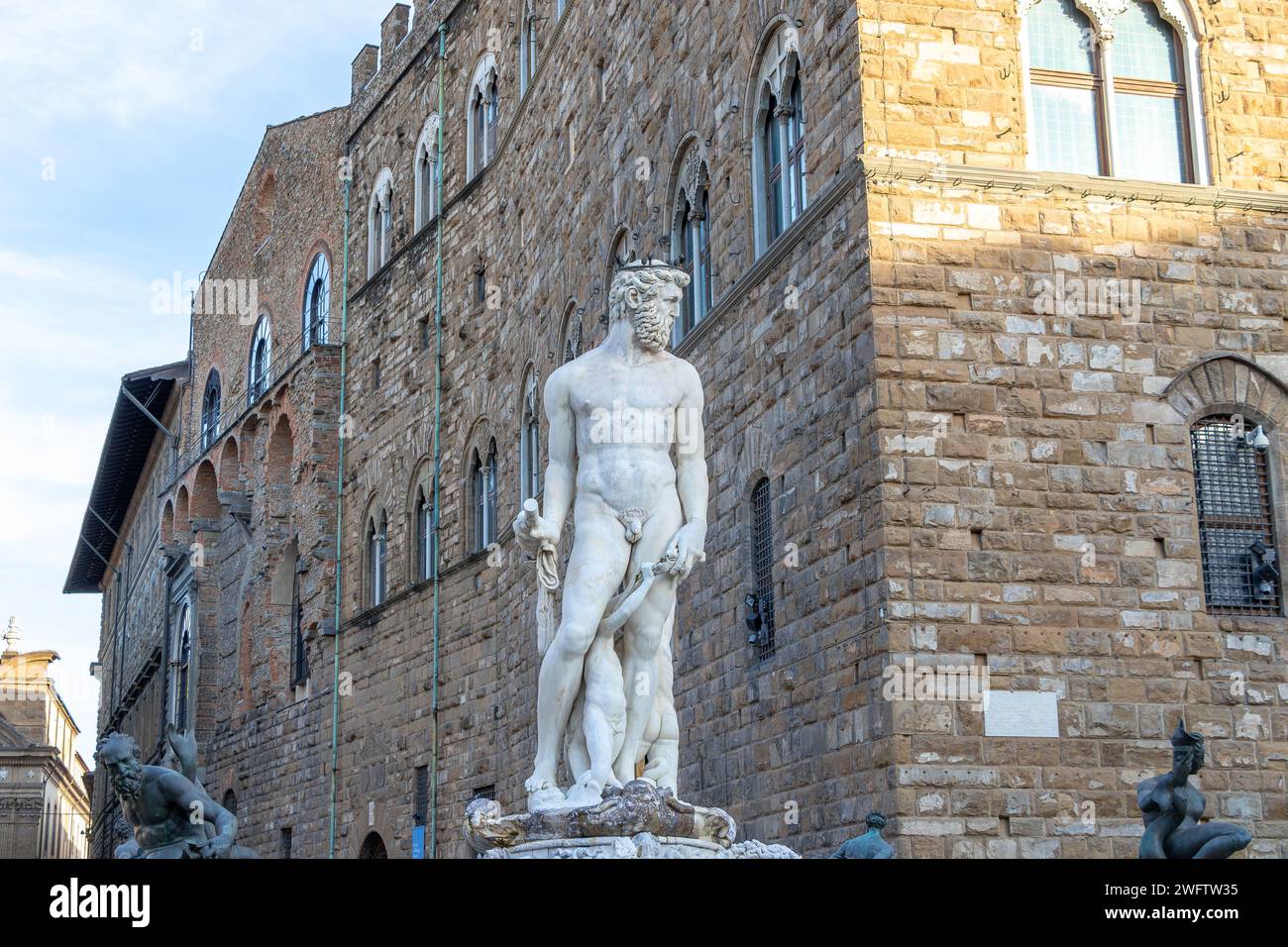 The statue of Neptune , The Biancone, with The Palazzo Vecchio in the ...