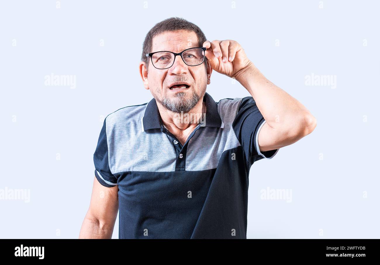 Mature Man Taking Off Glasses Amazed Looking At Camera Mature Person