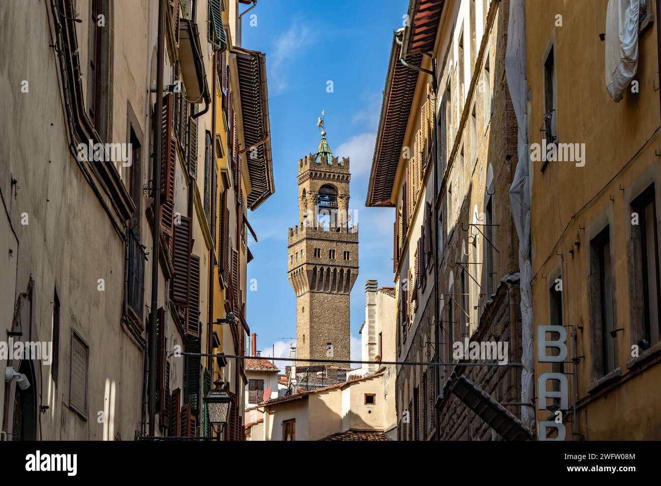 View along Via dei Neri,a street in Florence with the Palazzo Vecchio ...