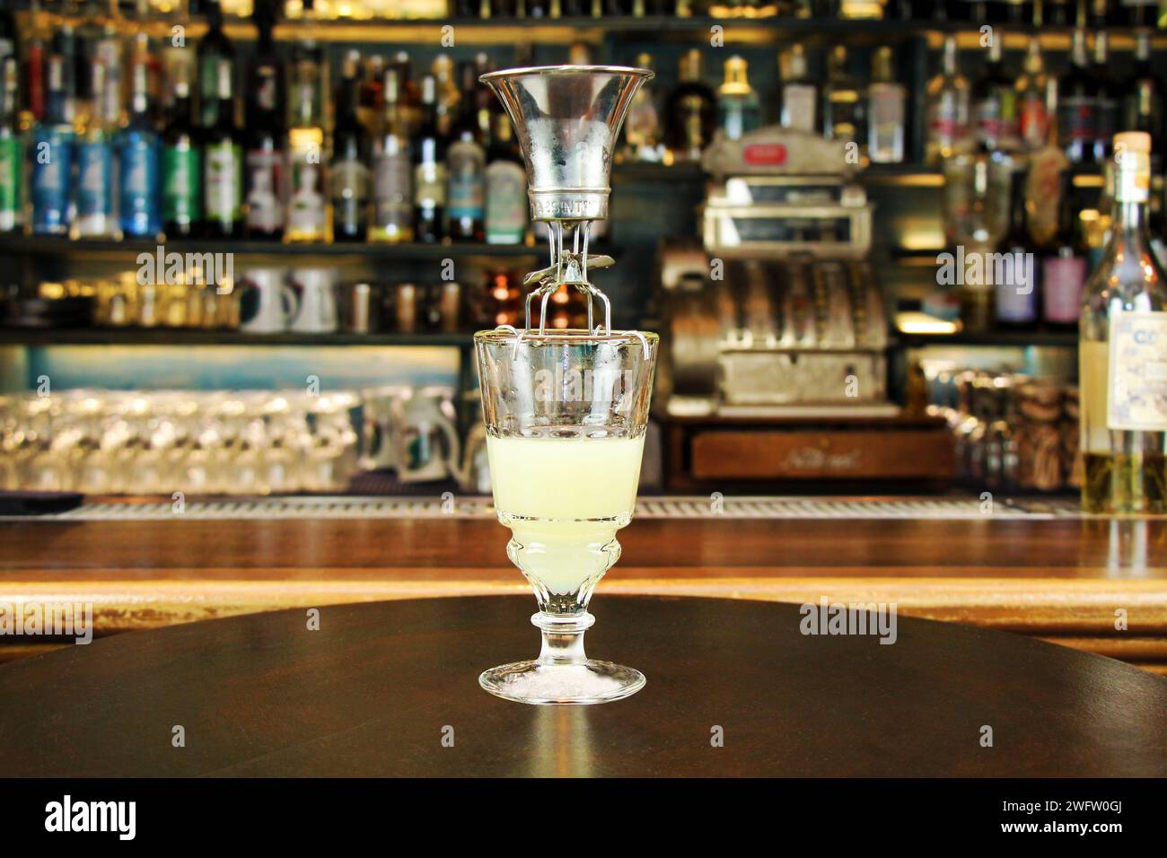 Classic type of absinthe preparation with brouiller (a tool for ...
