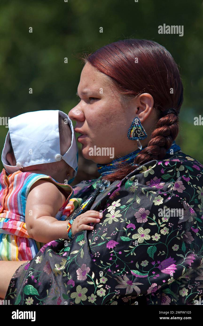 Mother holding baby close hi-res stock photography and images - Alamy