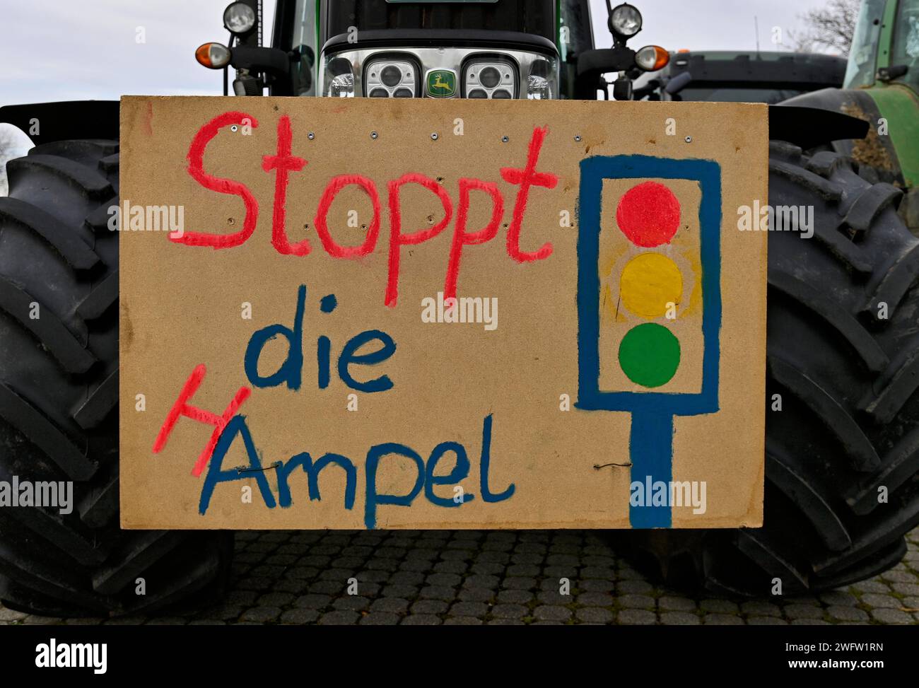 Farmers' protest, protest posters on tractors, tractors, STOP DIE ...