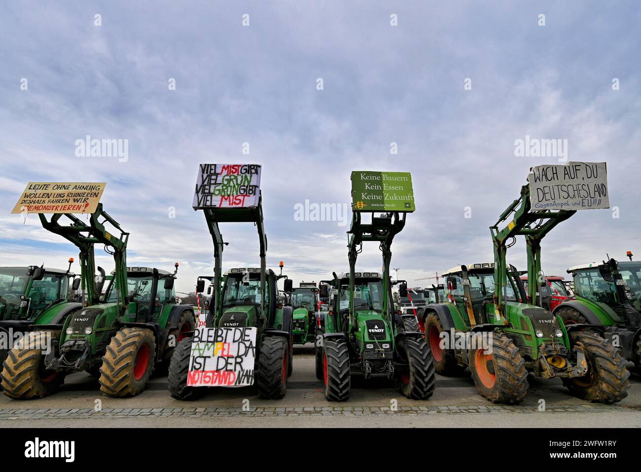Farmers' protest, protest posters on tractors, tractors, Stuttgart ...