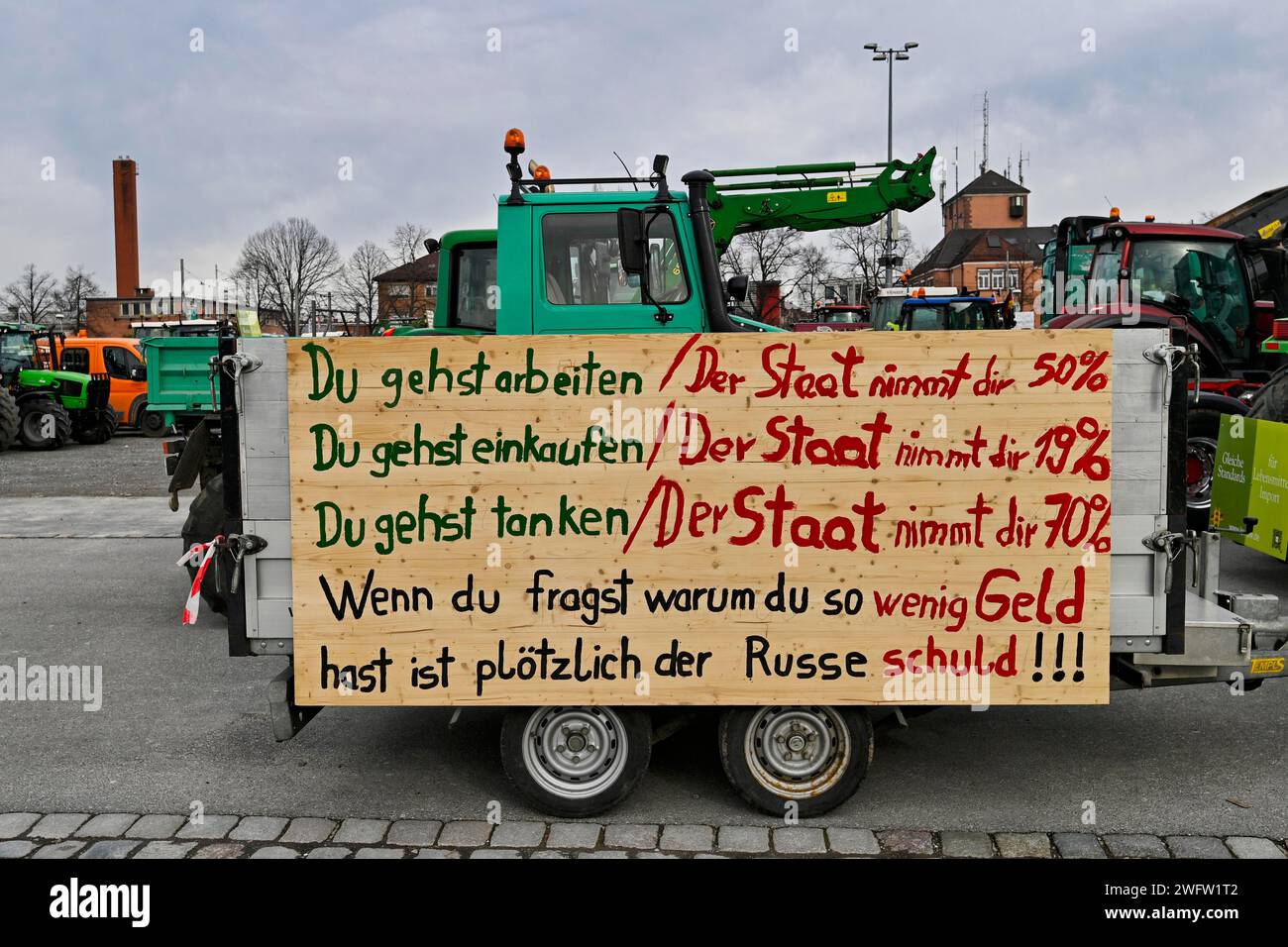 Farmers' protest, protest posters on tractors, tractors, Stuttgart ...