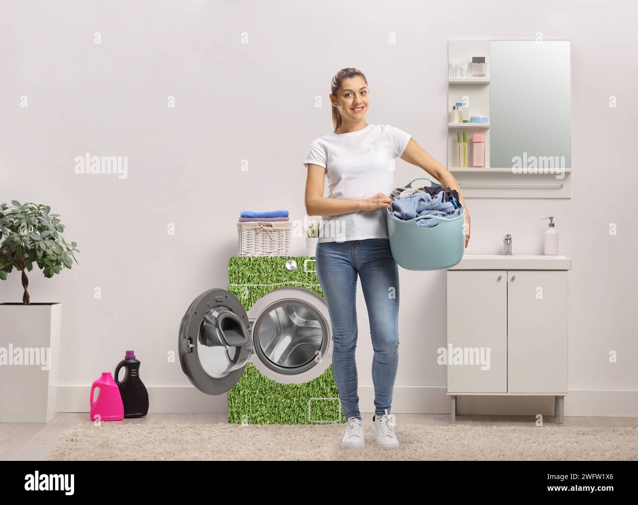 Woman washing machine eco hi-res stock photography and images - Alamy