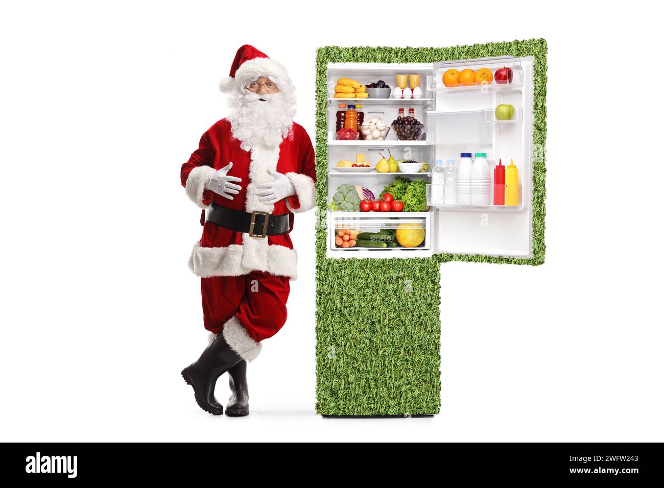 Santa claus leaning on a green eco-friendly fridge isolated on white ...