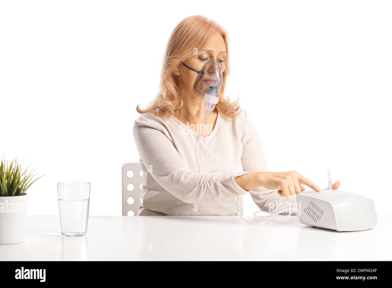 Nebulizer aerosol woman inhaler machine hi-res stock photography and ...