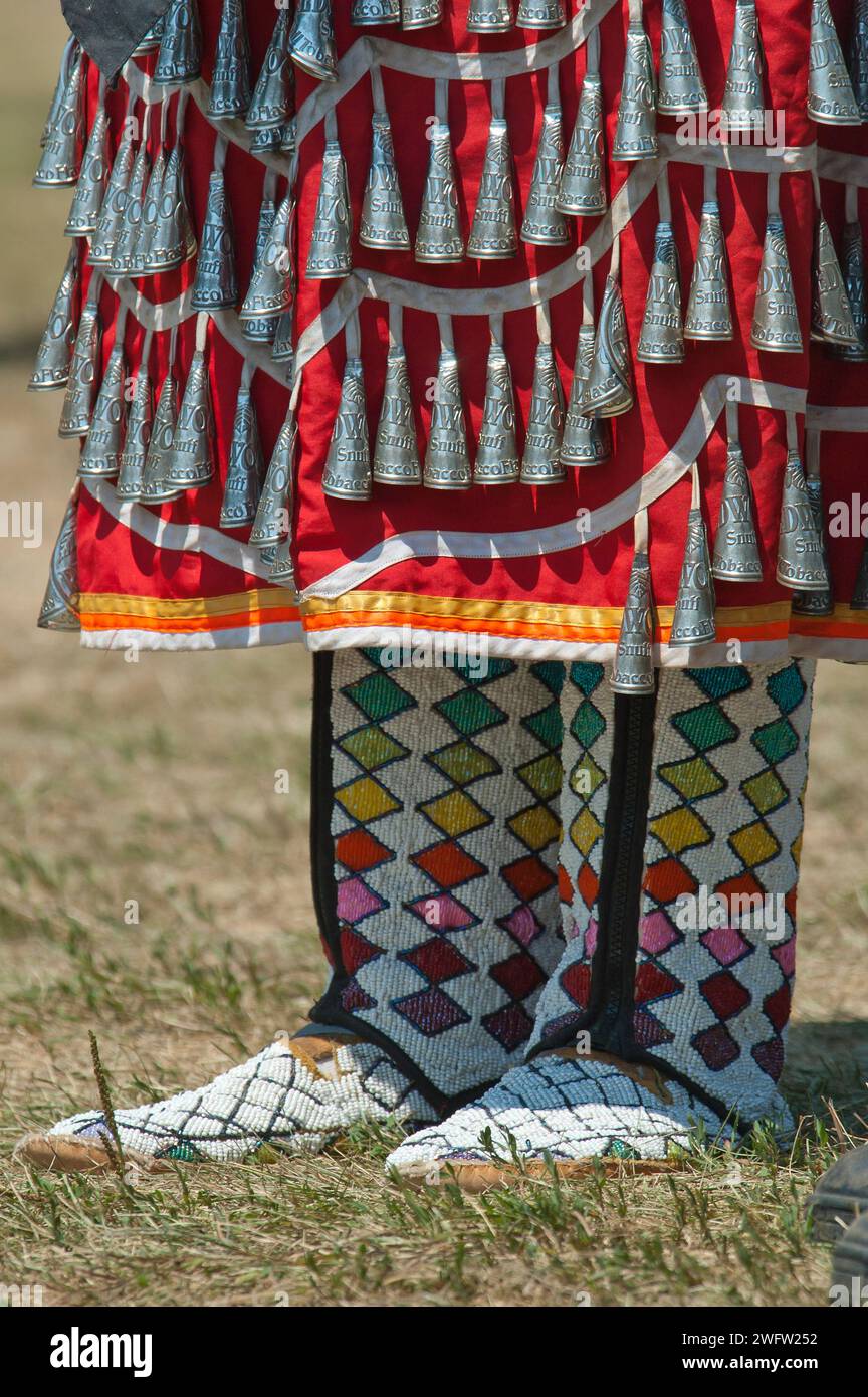 Native american moccasins and Bell dress in a Powwow Stock Photo - Alamy