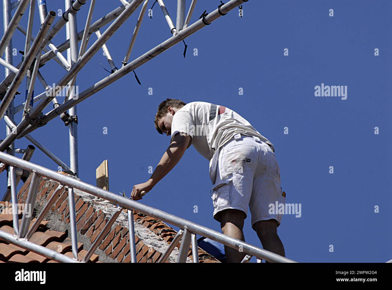 KASTRUP/COPENHAGEN/DENMARK Construction worker male wroking on roof ...