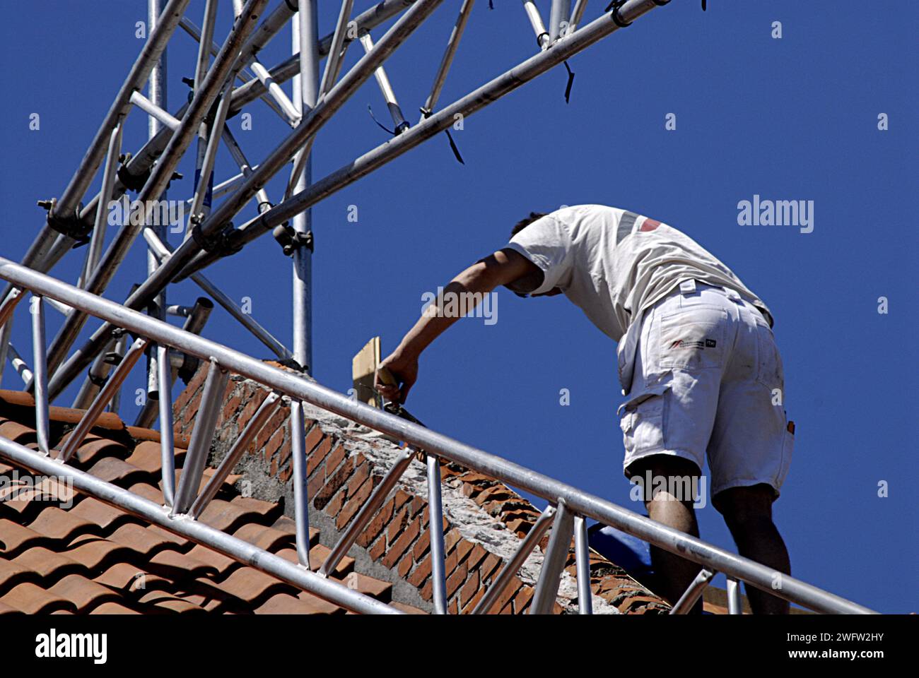 KASTRUP/COPENHAGEN/DENMARK Construction worker male wroking on roof ...