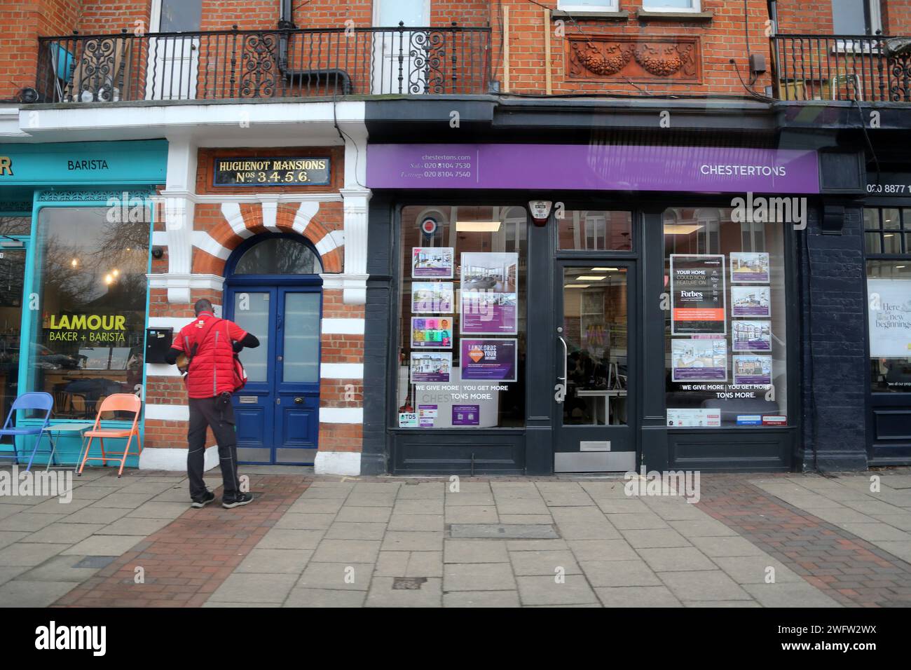 Postman on Streets Outside Huguenot Mansions And Chestertons Estate ...