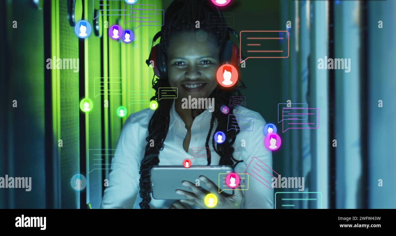 Image of social media icons over african american woman working in ...