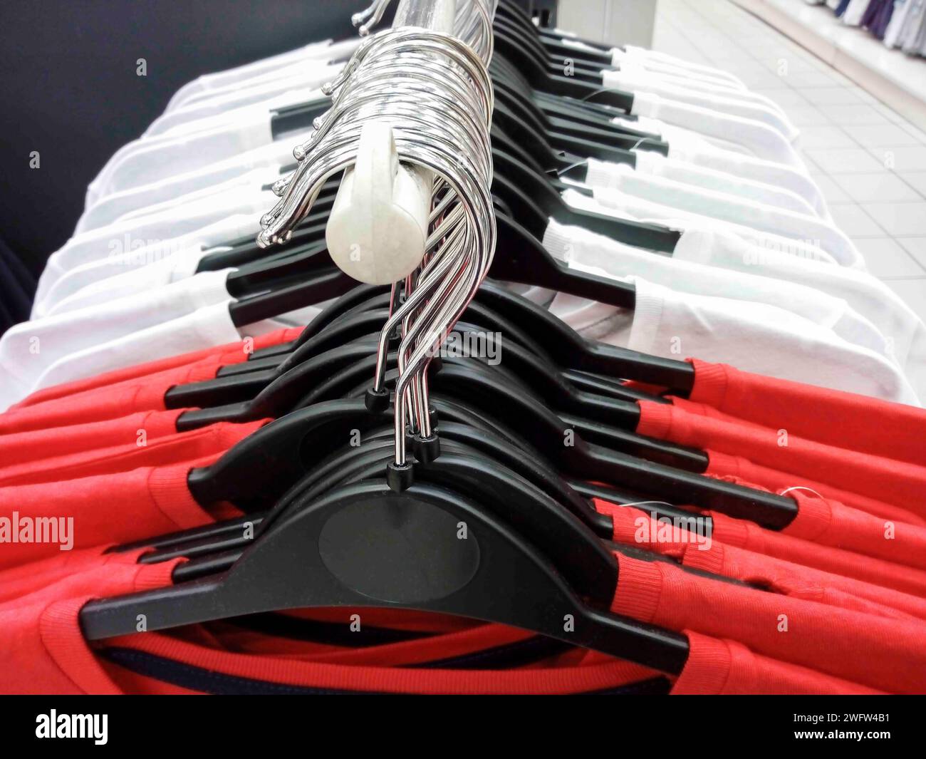 Hangers shop in market in thrift store hi-res stock photography and ...