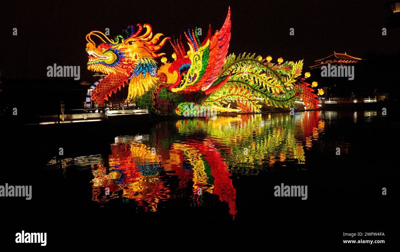 Colorful lights are illuminating the interior of Tang Paradise in Xi'an ...