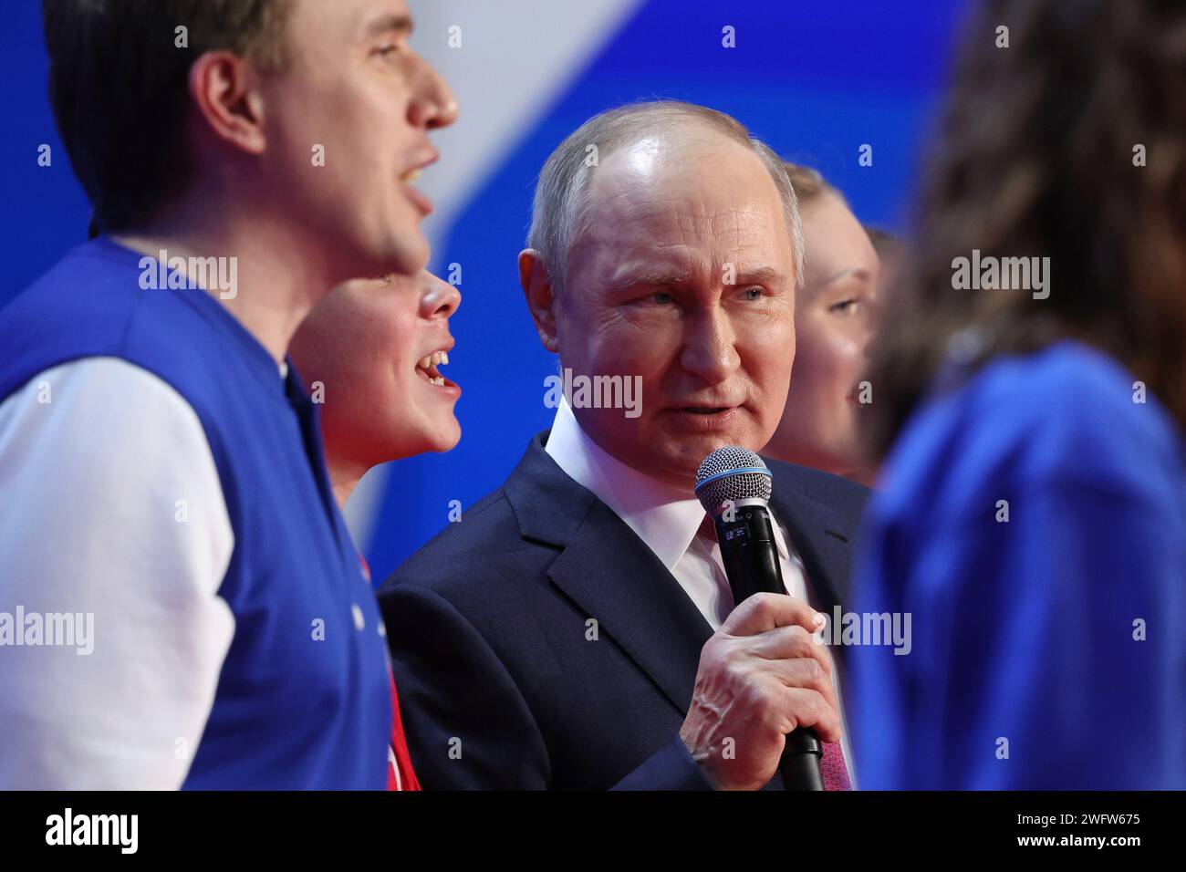 Russian President Vladimir Putin sings the national anthem during the ...