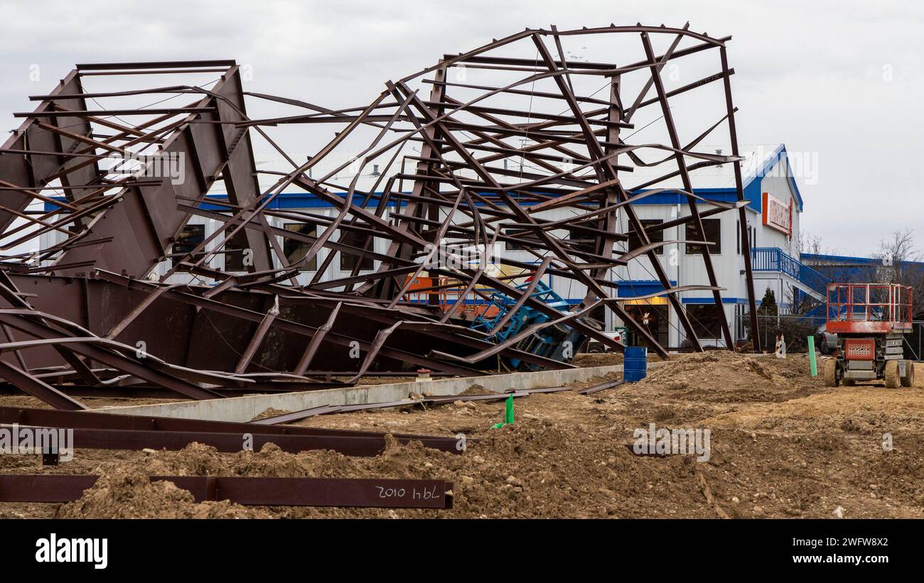 Twisted girders and debris cover the ground from a deadly structure ...