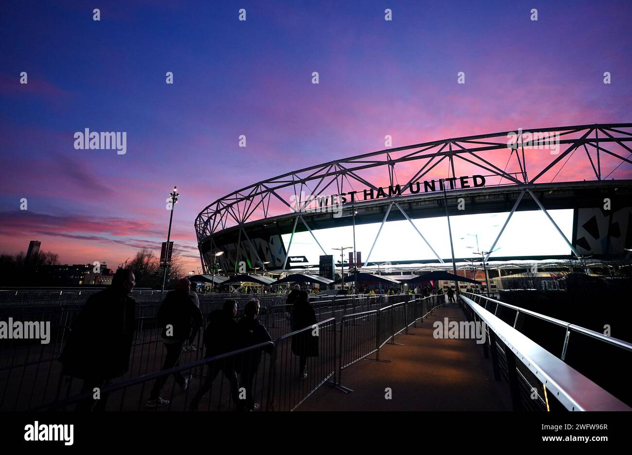 Fans make their way to the ground ahead of the Premier League match at ...