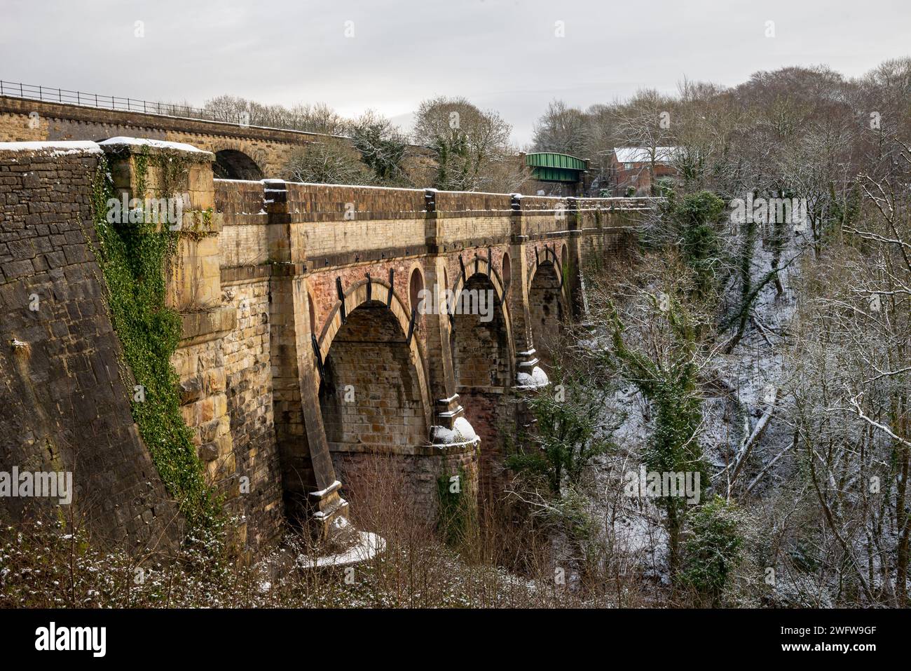 A snowy morning on the Peak Forest Canal at Marple, Stockport, Greater ...