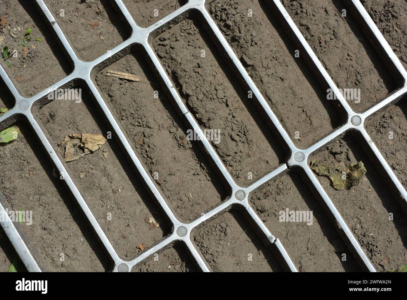 Metal grating made of natural steel, stainless steel, cast metal is ...