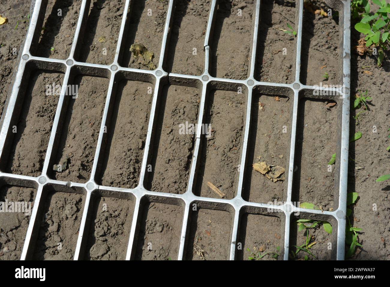 Metal grating made of natural steel, stainless steel, cast metal is ...