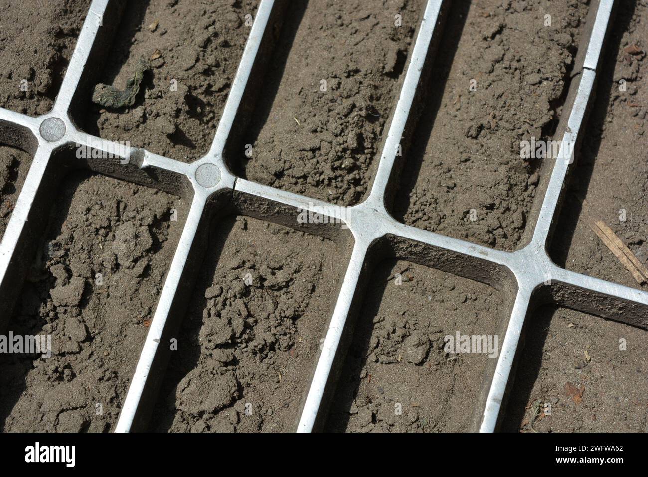 Metal grating made of natural steel, stainless steel, cast metal is ...