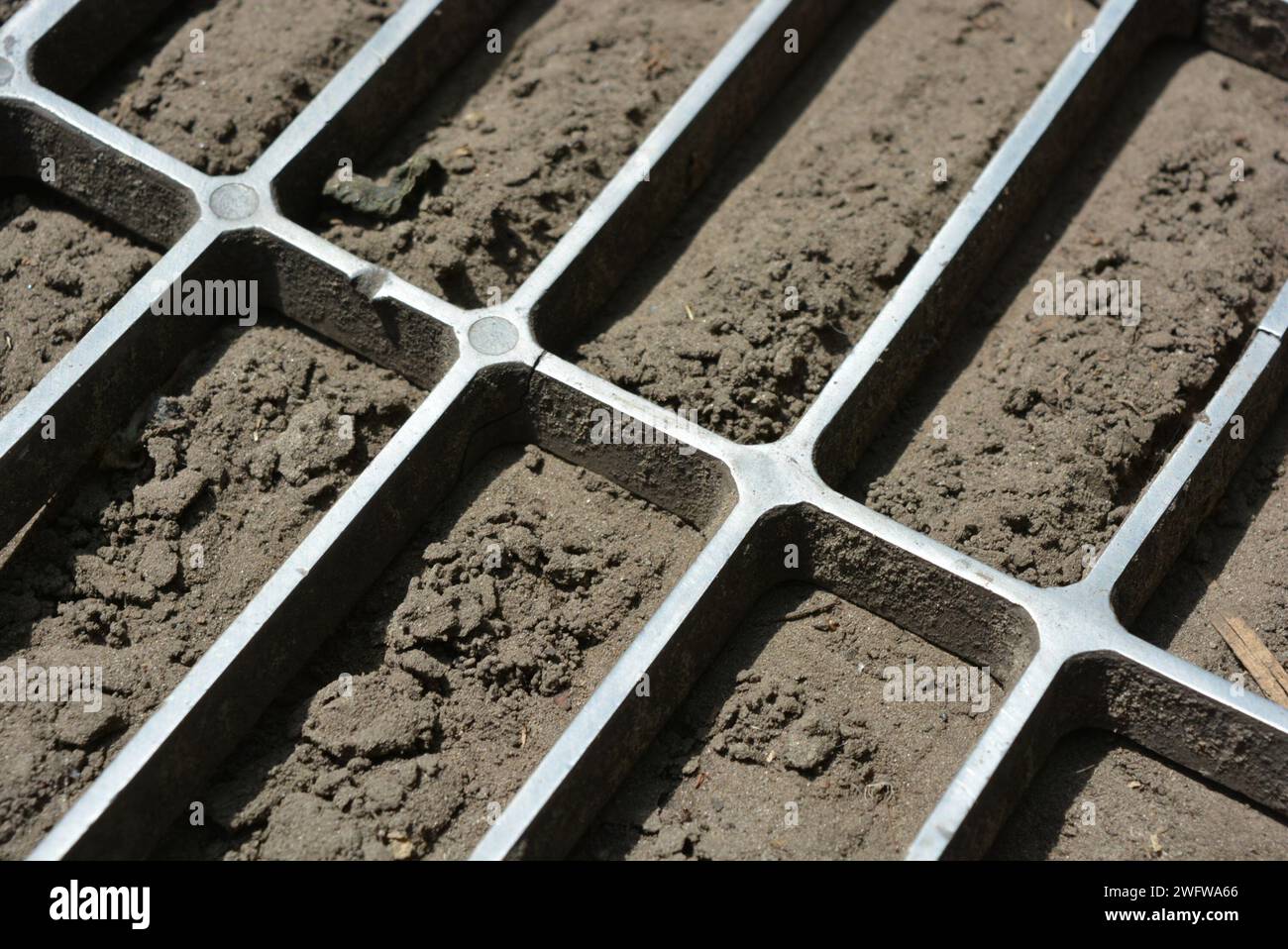 Metal grating made of natural steel, stainless steel, cast metal is ...