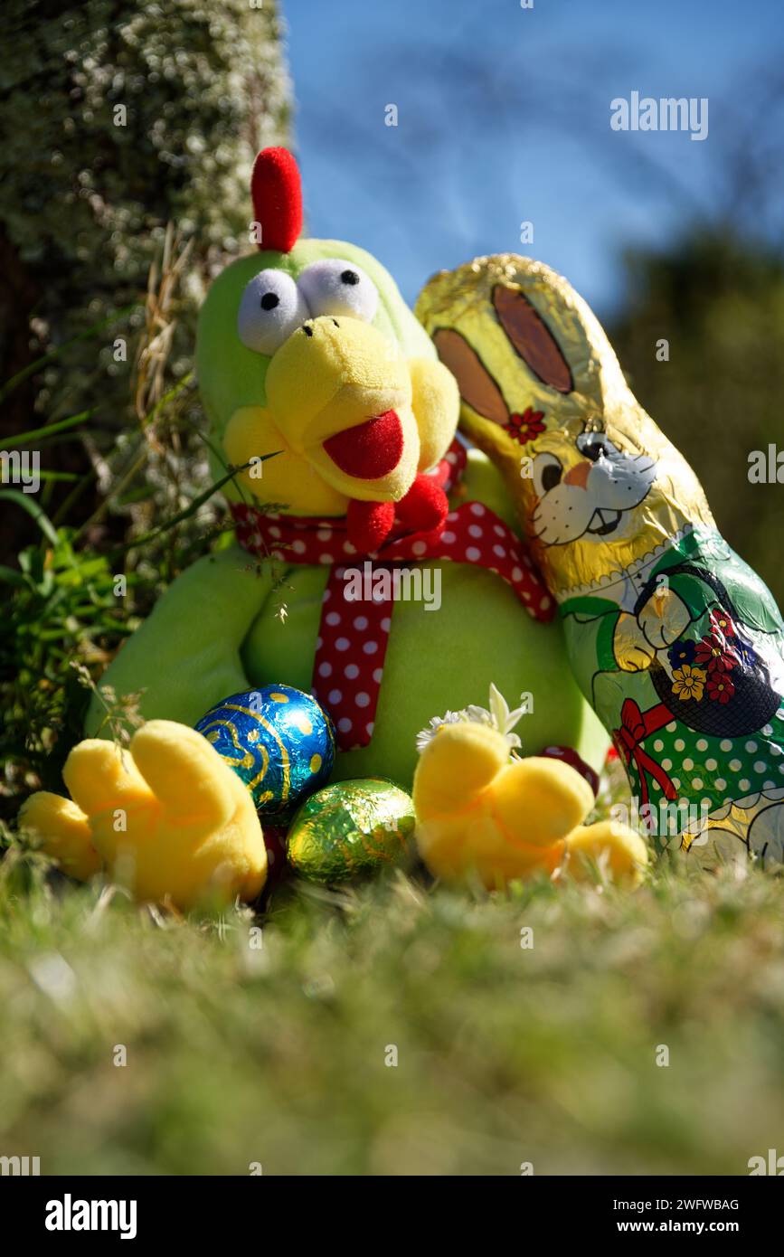 Easter, pretty colored chocolate eggs, in the garden Stock Photo - Alamy