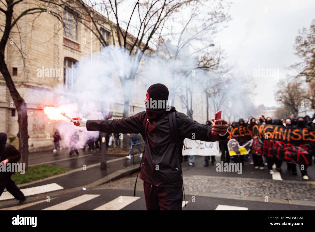 Paris, France. 01st Feb, 2024. A student holds a torch during the ...