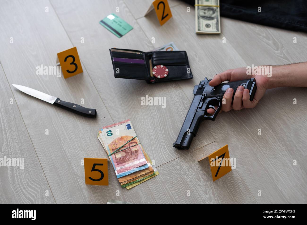 Crime scene with bullets on floor hi-res stock photography and images ...