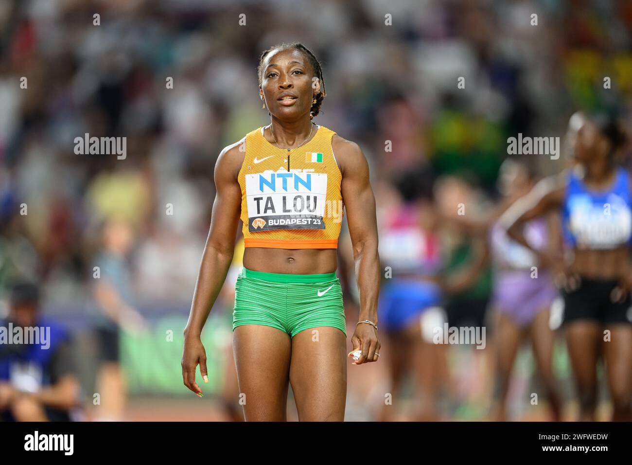 Marie-Josée TA LOU participating in the 100 meters at the World ...