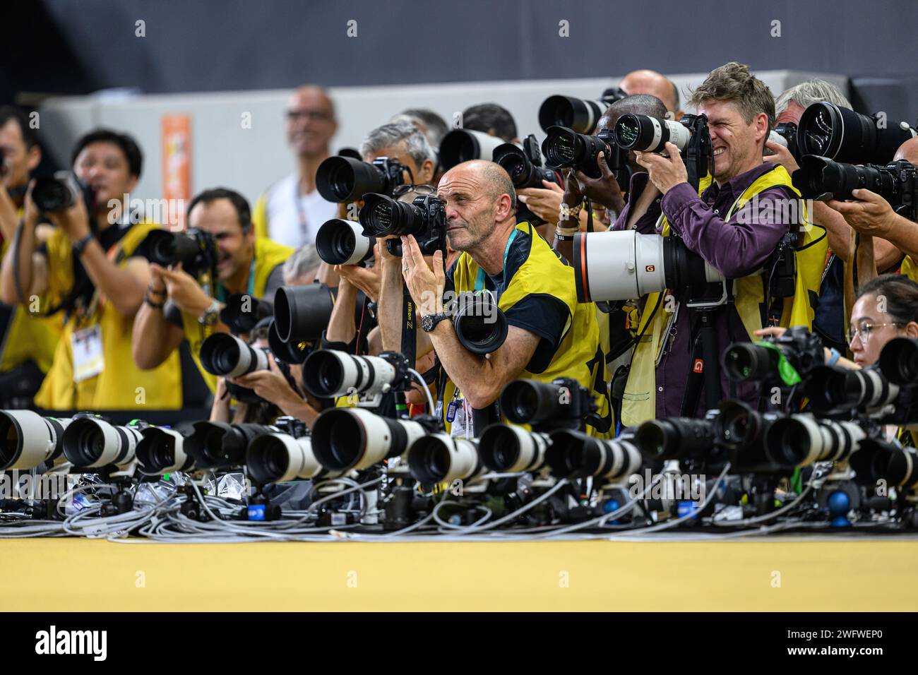 Many photographers at a sporting event Stock Photo - Alamy