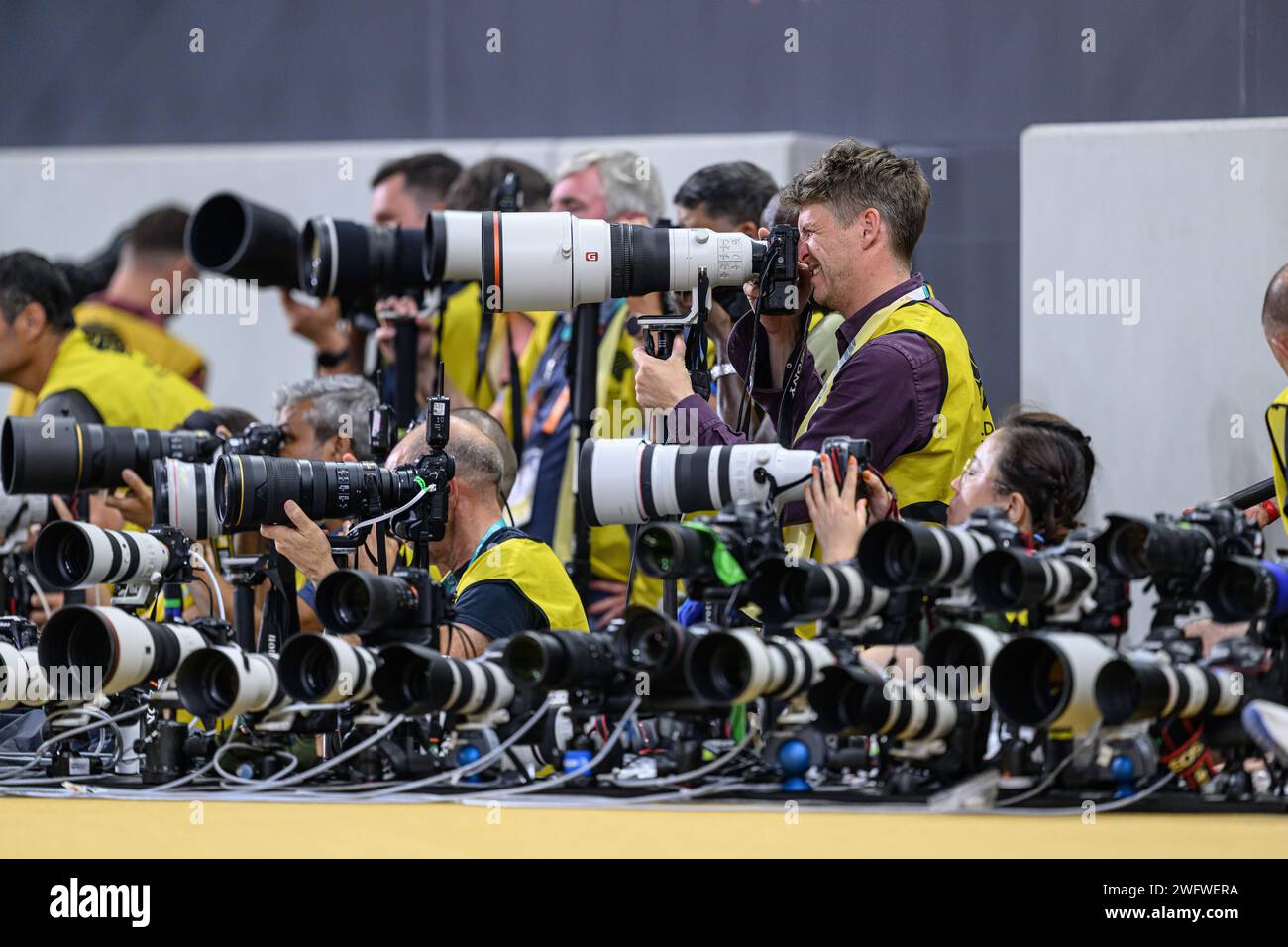 Many photographers at a sporting event Stock Photo - Alamy